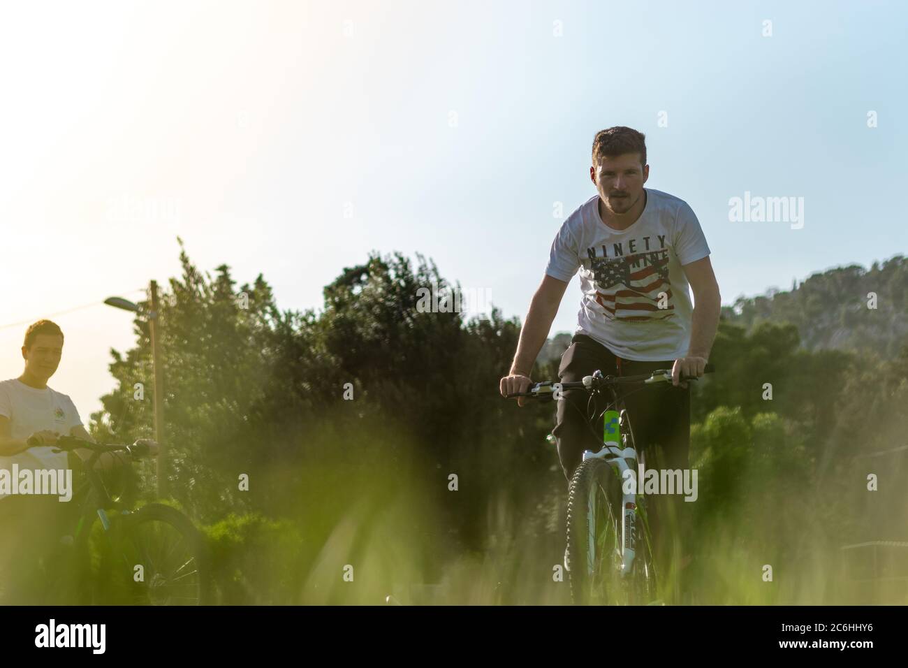 Standing and pedaling hi-res stock photography and images - Alamy