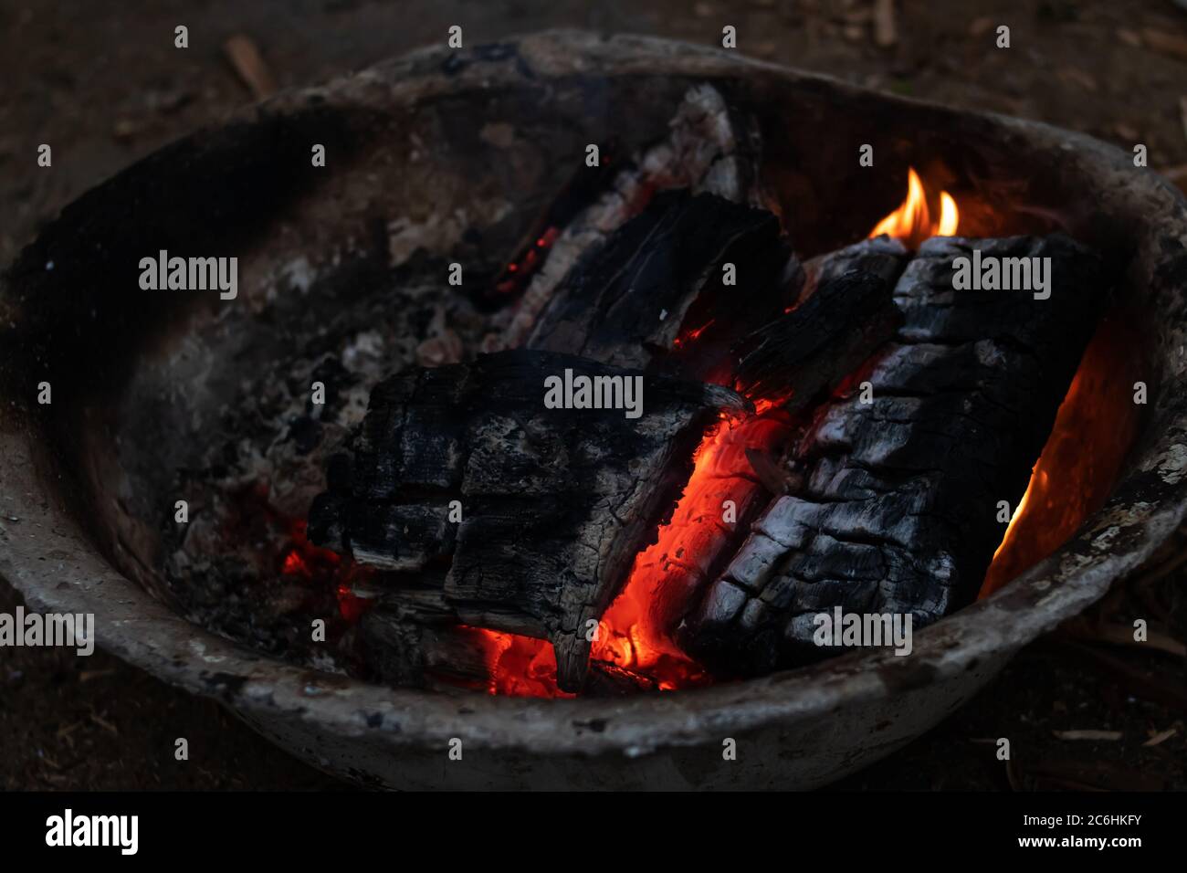 Coals of a bonfire in a basin Stock Photo - Alamy