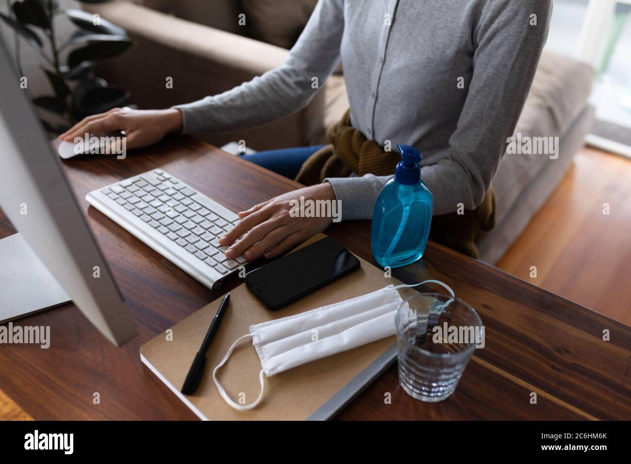 Using computer at home hi-res stock photography and images - Alamy