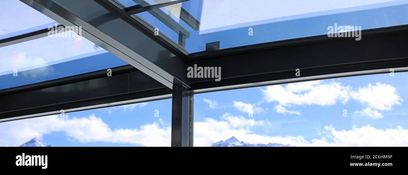 Interior view of a modern conservatory (winter garden) in an alpine ...