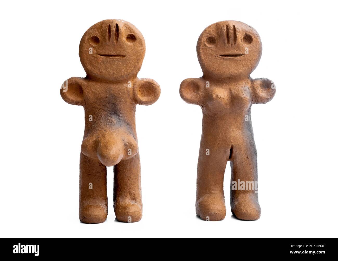 Ancient clay male and female figurines from Canary Islands isolated on ...