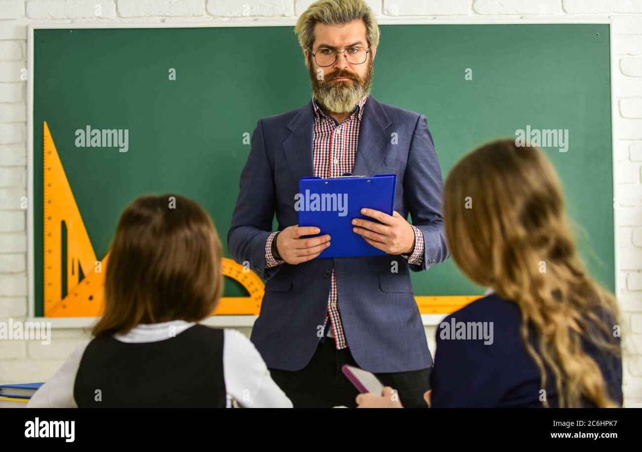 Teacher and kids Classroom. Dialogue and communication. Daily school ...