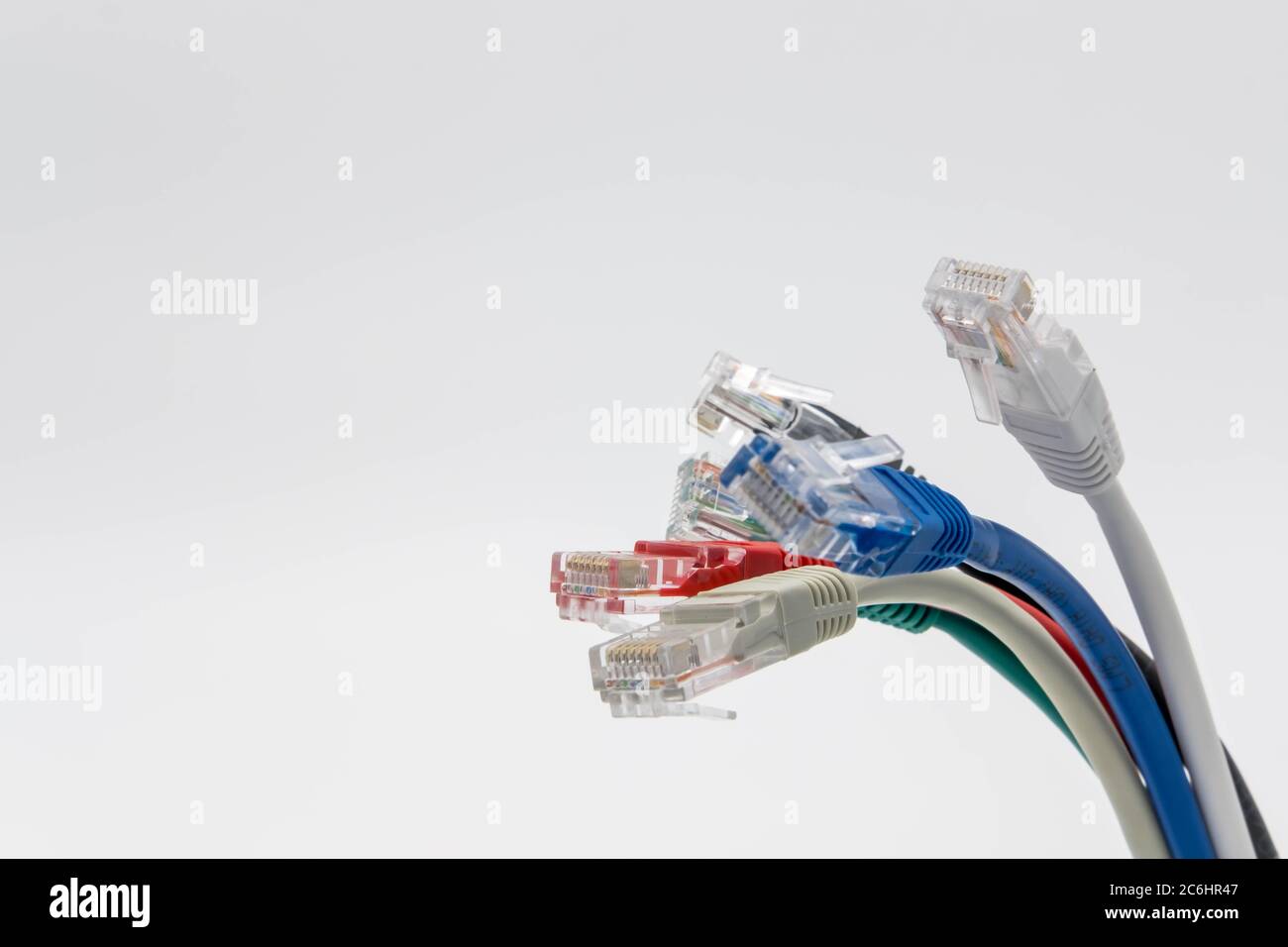 Close-up of multicoloured Ethernet networking patch leads showing ...