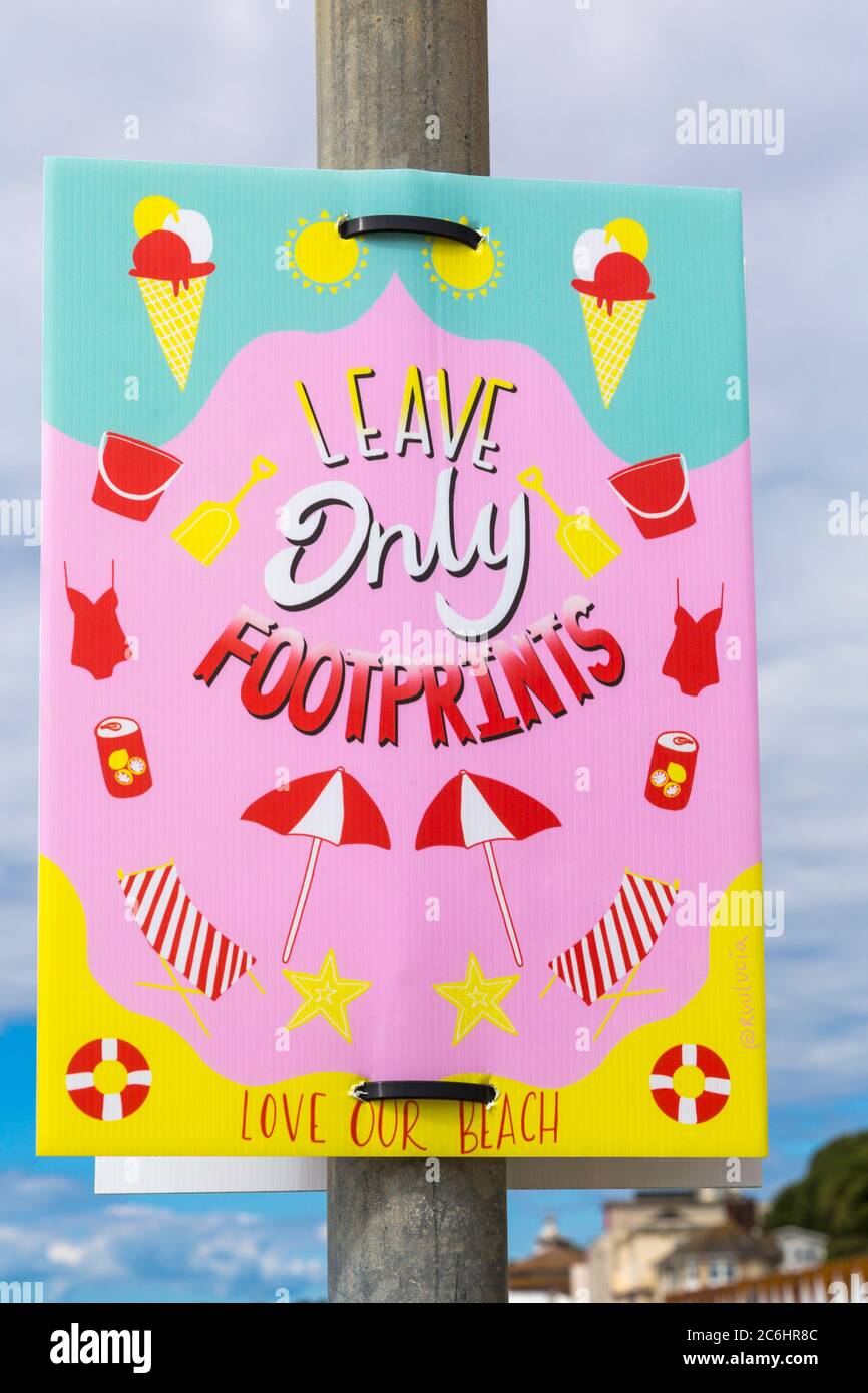 Leave only footprints love our beach sign hi-res stock photography and ...