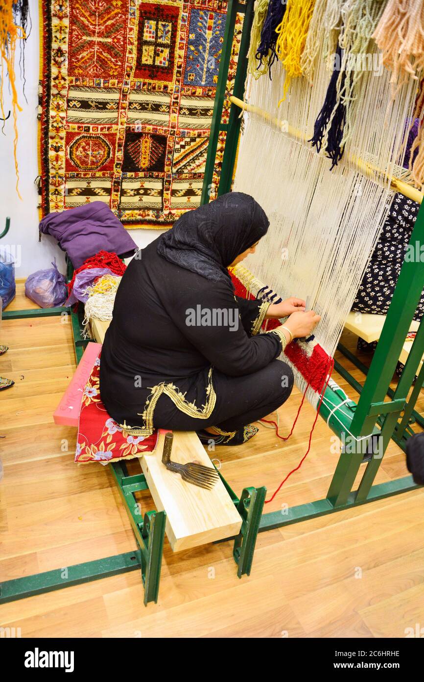 Rabat, Morocco - November 19th 2014: Unidentified woman on weaving loom ...
