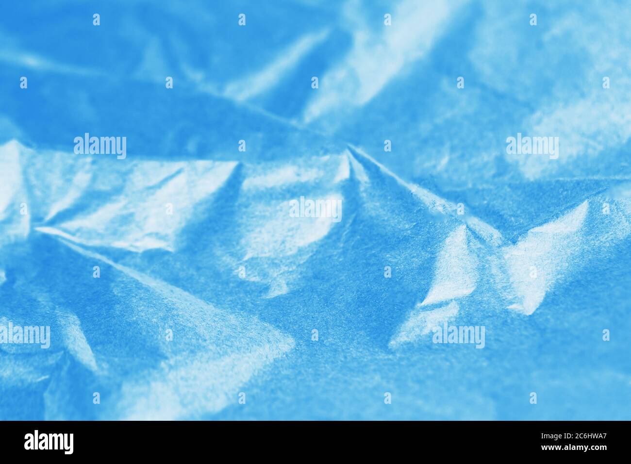 Crumpled blue color paper abstract texture background Stock Photo - Alamy