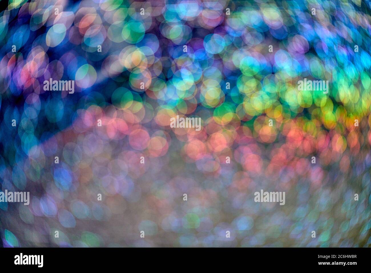 Rainbow sparkle glitter. Abstract backdrop. Colorful glowing rainbow ...