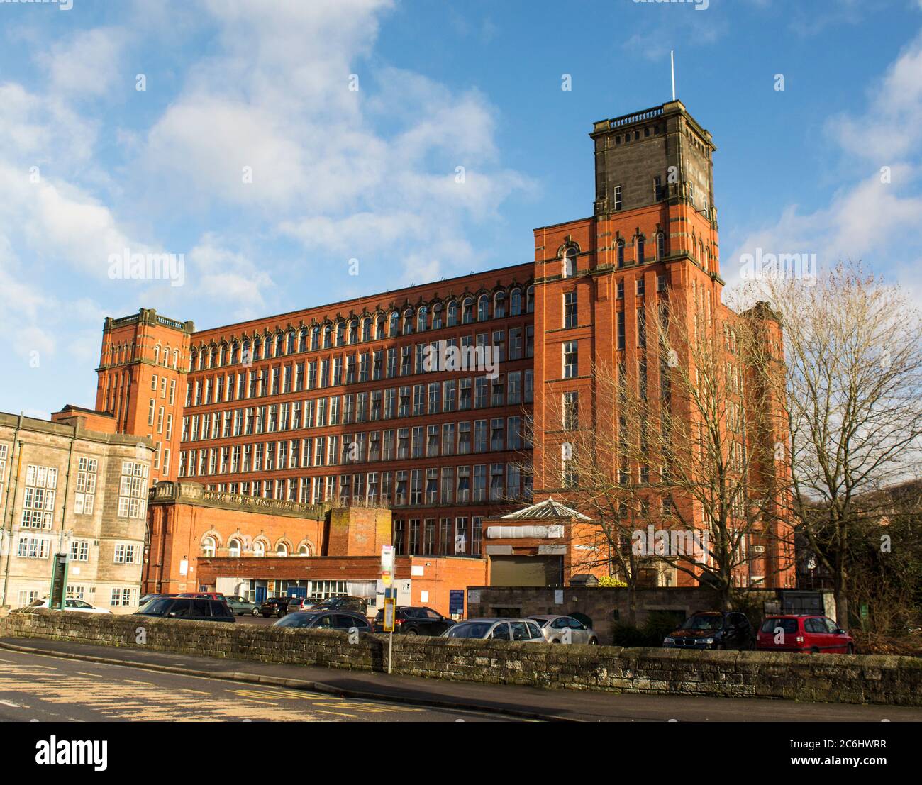 Tall old Derbyshire mill building Stock Photo - Alamy