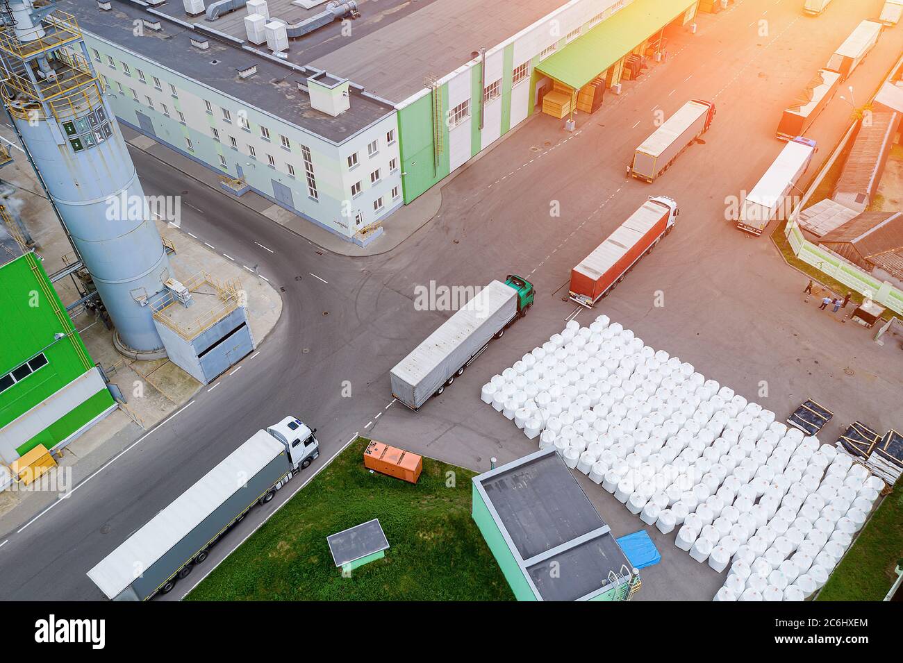trucks waiting to load at the factory top view Stock Photo - Alamy