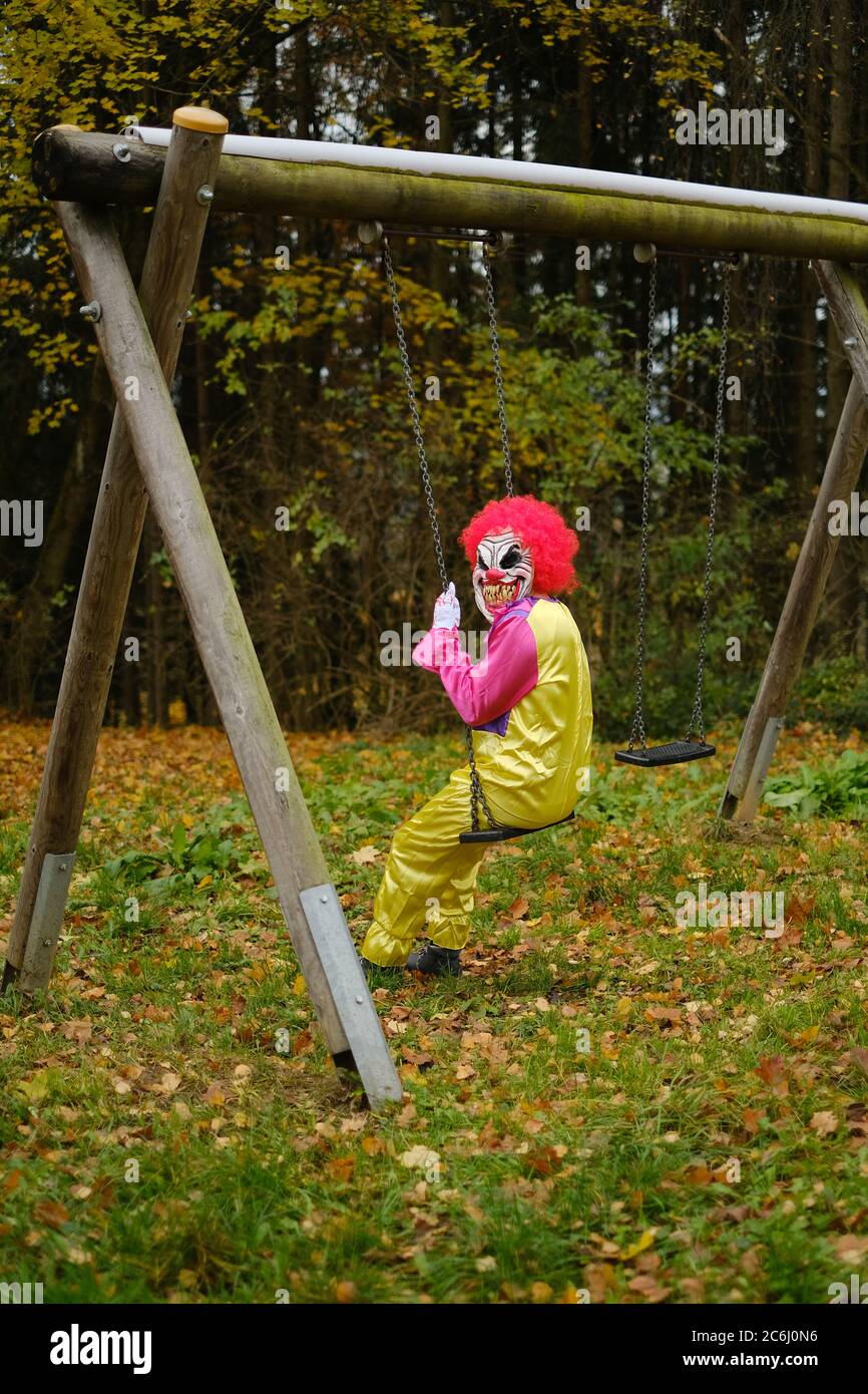 Creepy swing hi-res stock photography and images - Alamy