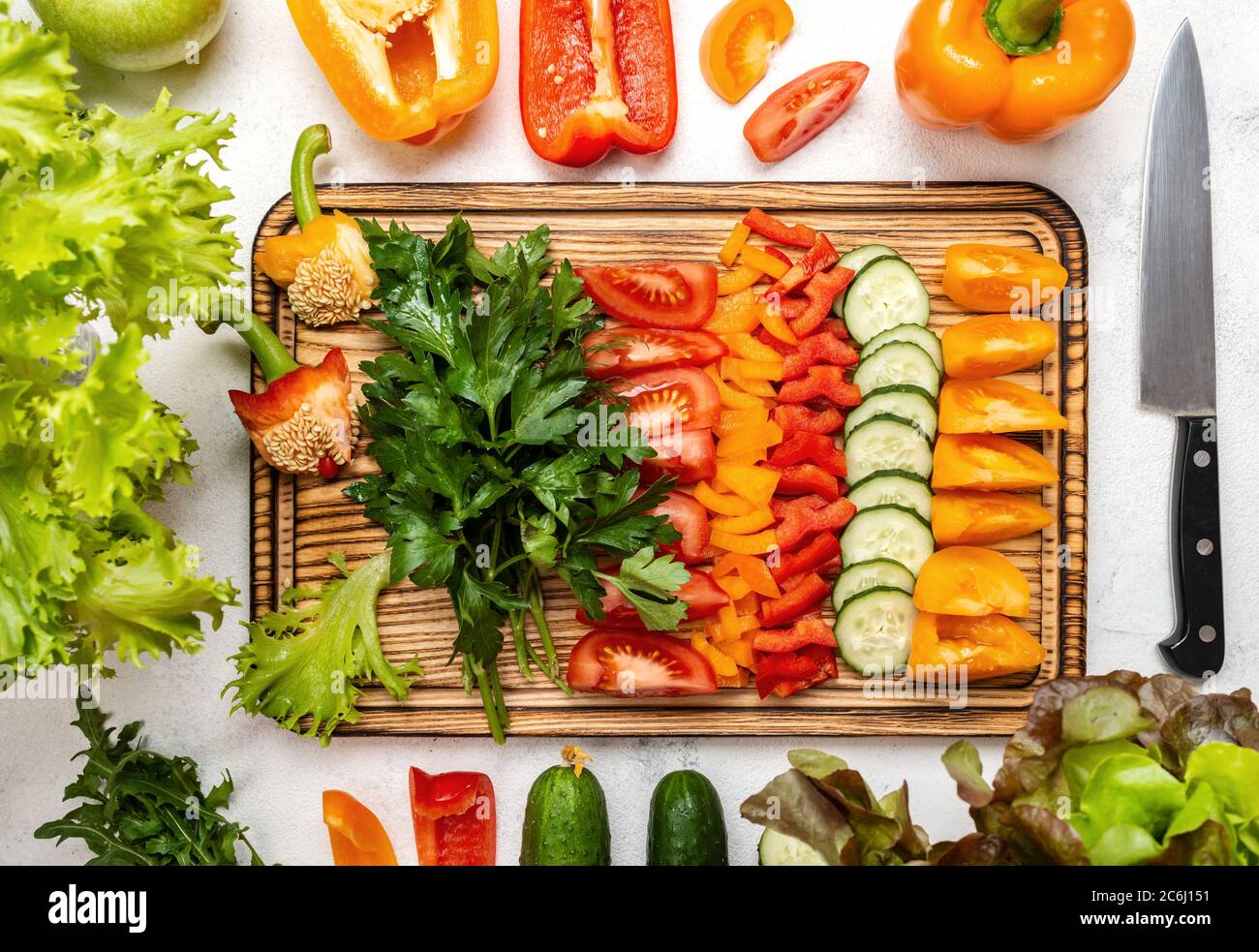 Preparing cutting vegetables for cooking healthy food Stock Photo - Alamy