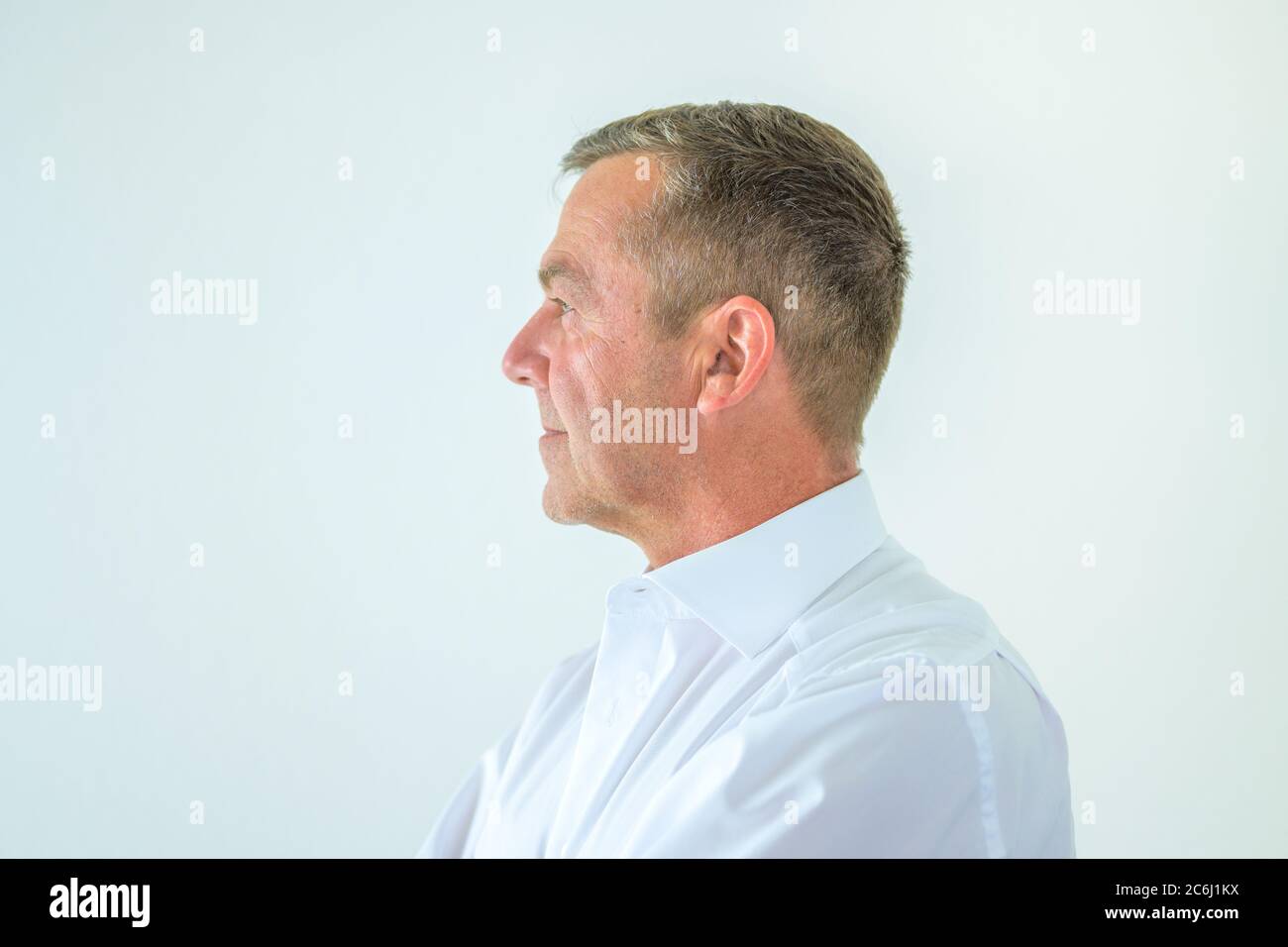 Side view of an serious middle-aged man with deadpan expression Stock ...