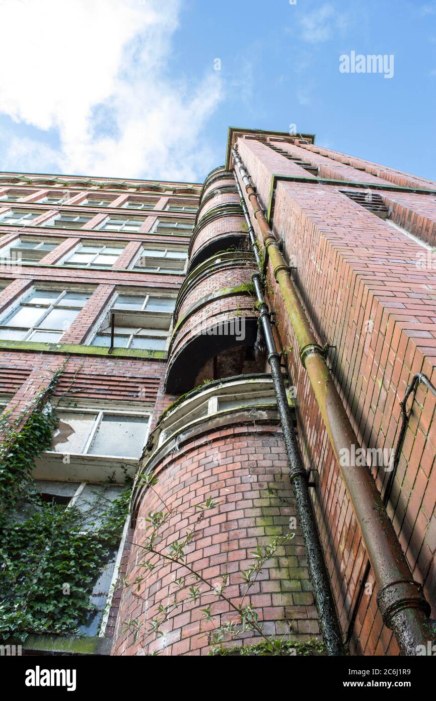 Tall old Derbyshire mill building Stock Photo - Alamy