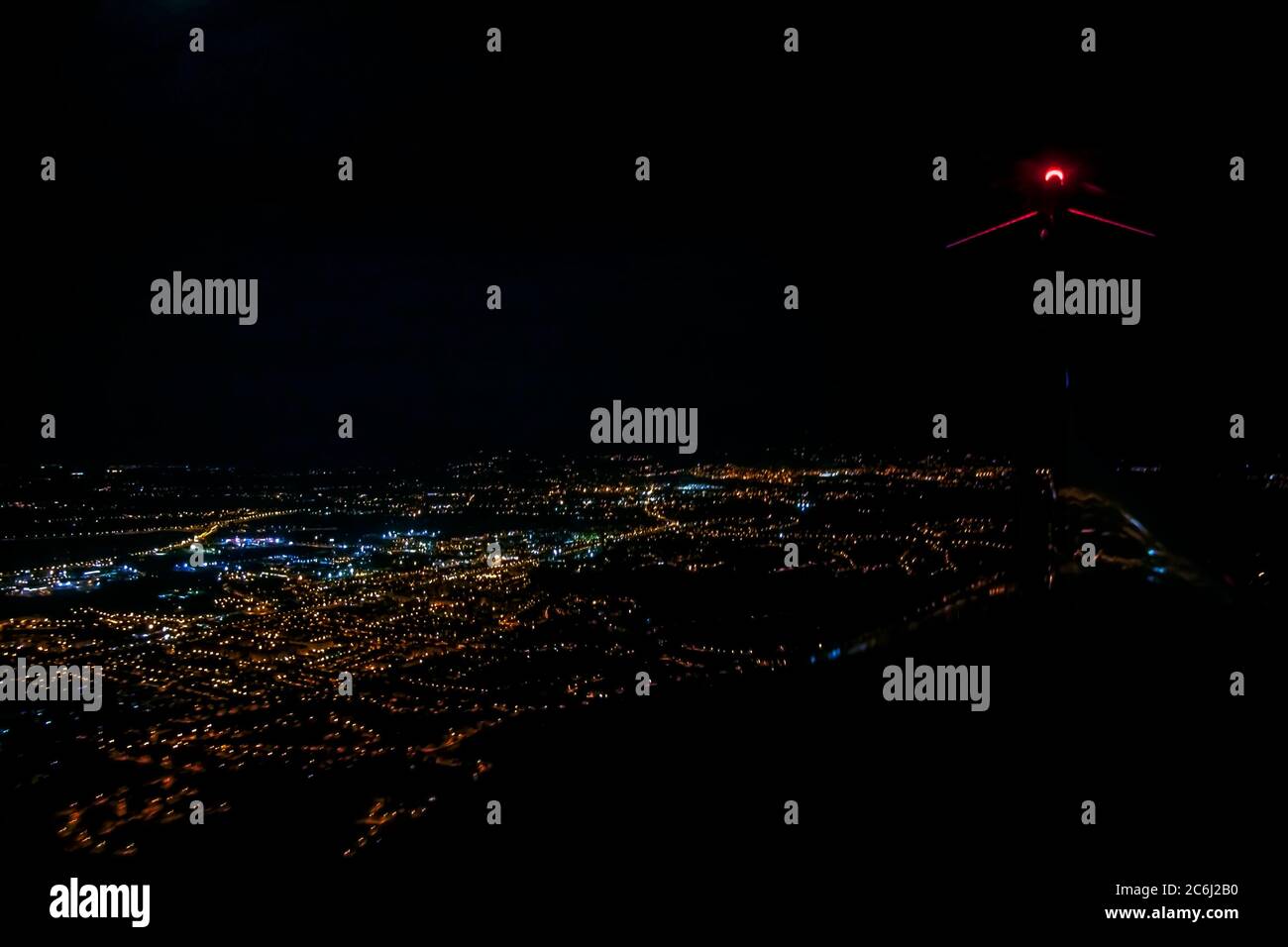 Red light on the tail of the flying airplane Stock Photo - Alamy