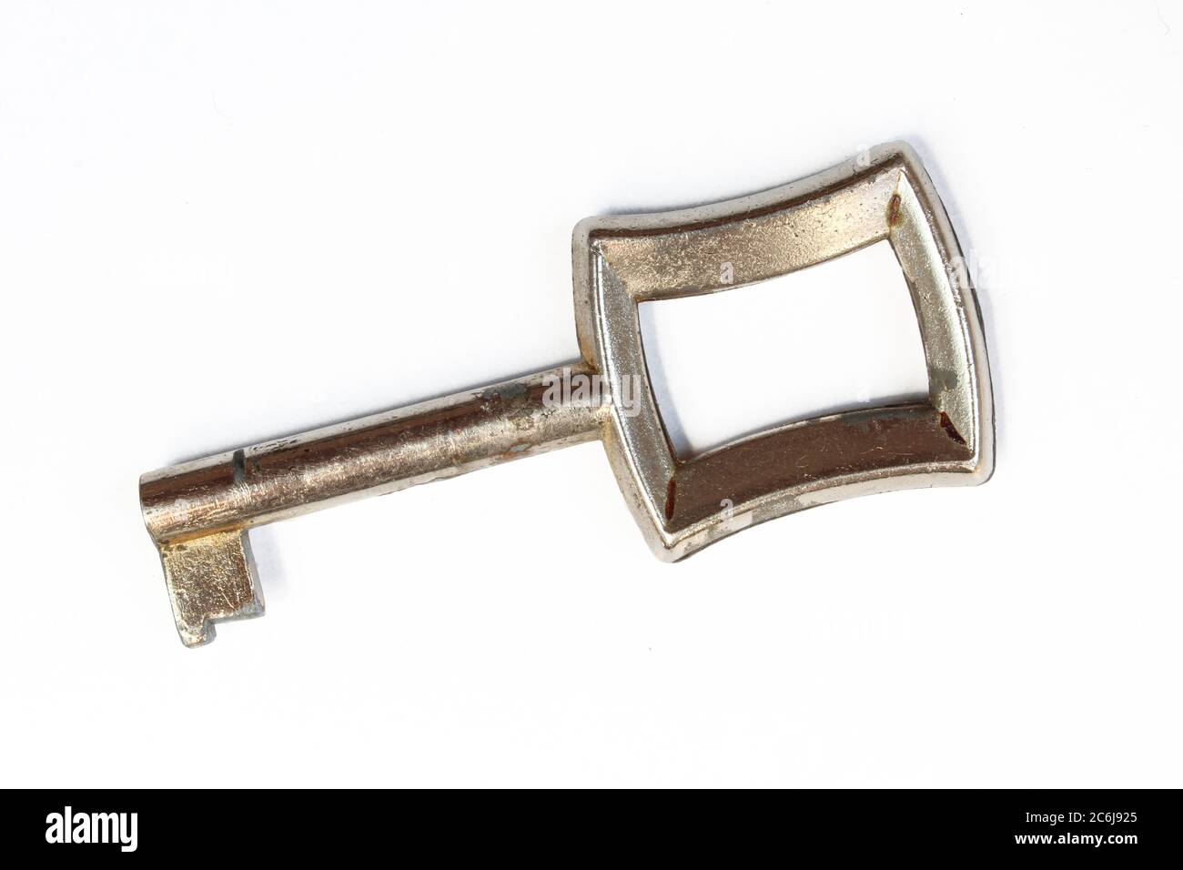 Silver old key isolated on white background. Retro looking key object ...