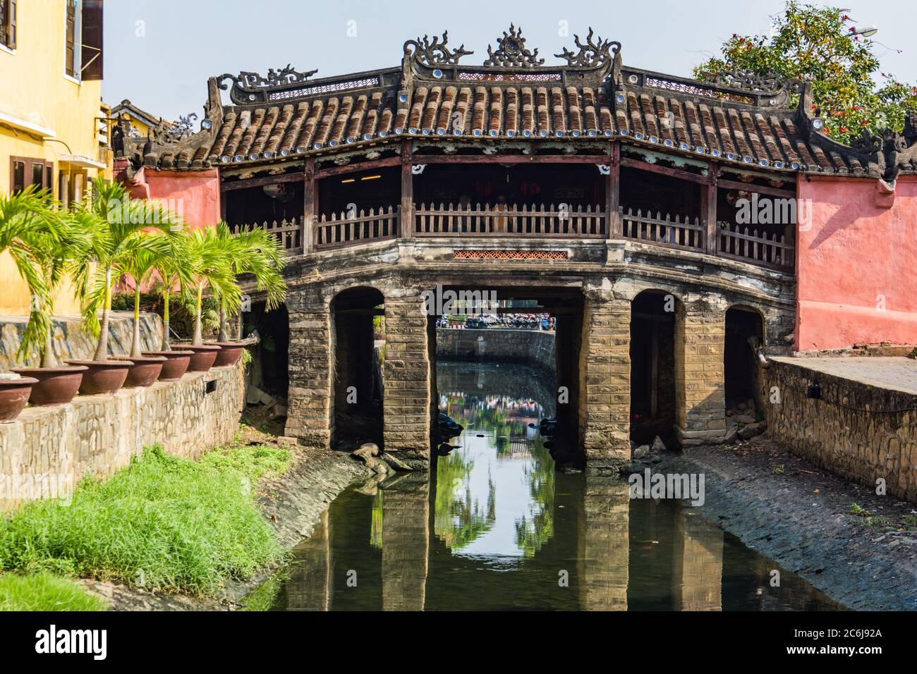 iconic historic Japanese covered bridge across river in ancient old ...