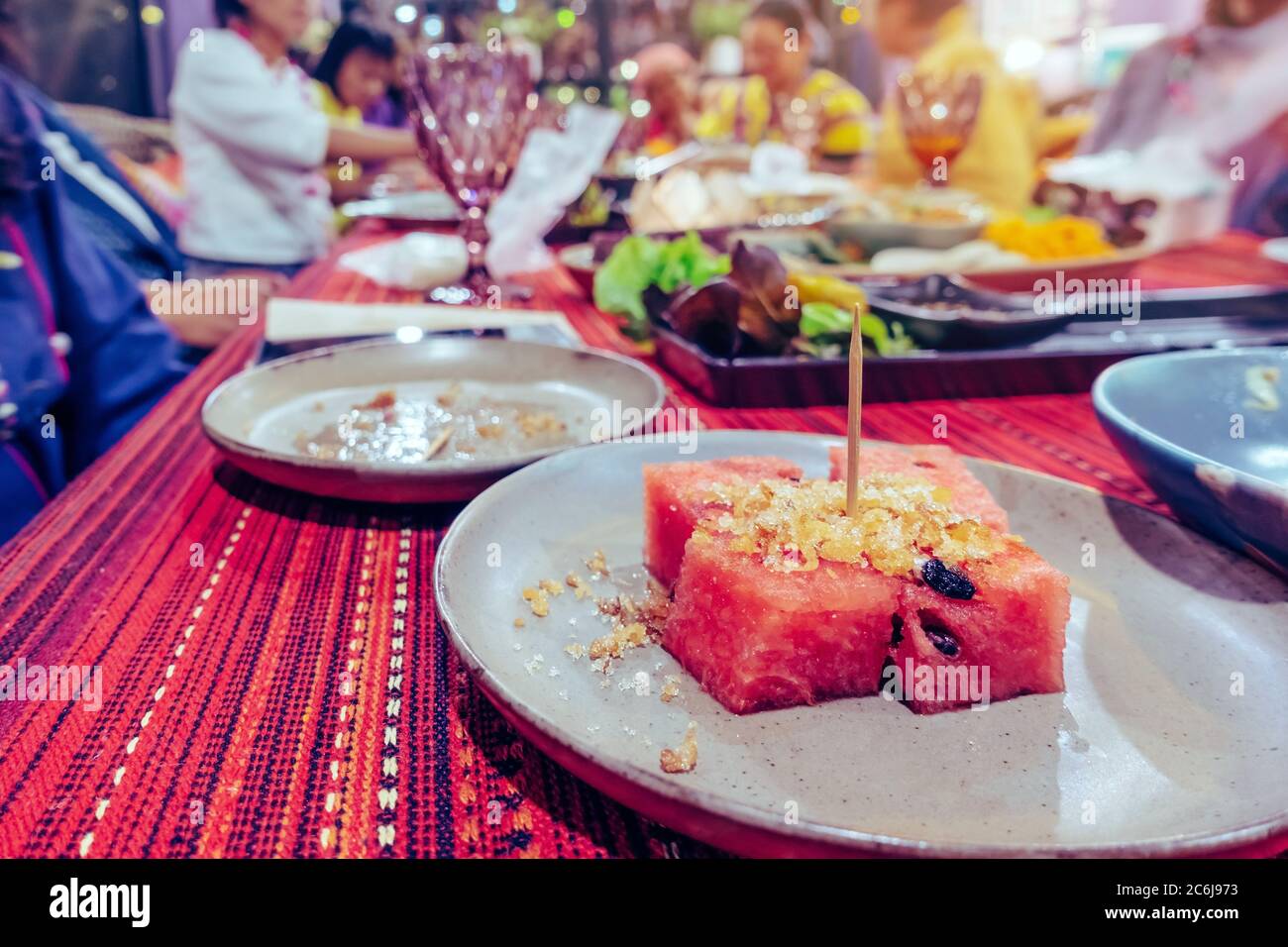 Fried dried fish with watermelon served as a dessert for party dinner ...