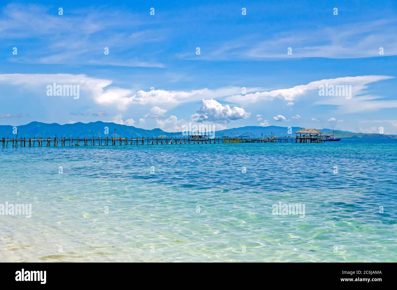 Wooden jetty on the island of Kanawa (Indonesia Stock Photo - Alamy