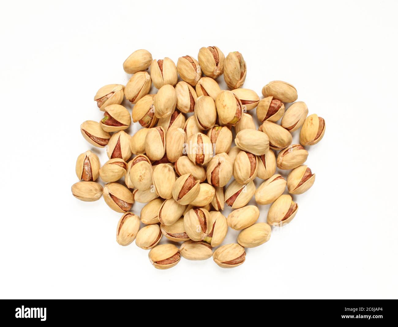 Group of raw and delicious pistachios in shell isolated on white ...