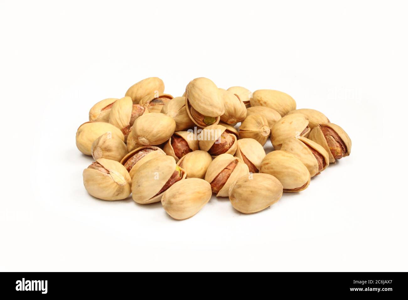 Group of raw and delicious pistachios in shell isolated on white ...