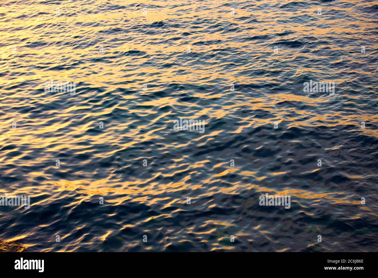 Sea water surface at sunset - Natural abstract background Stock Photo ...