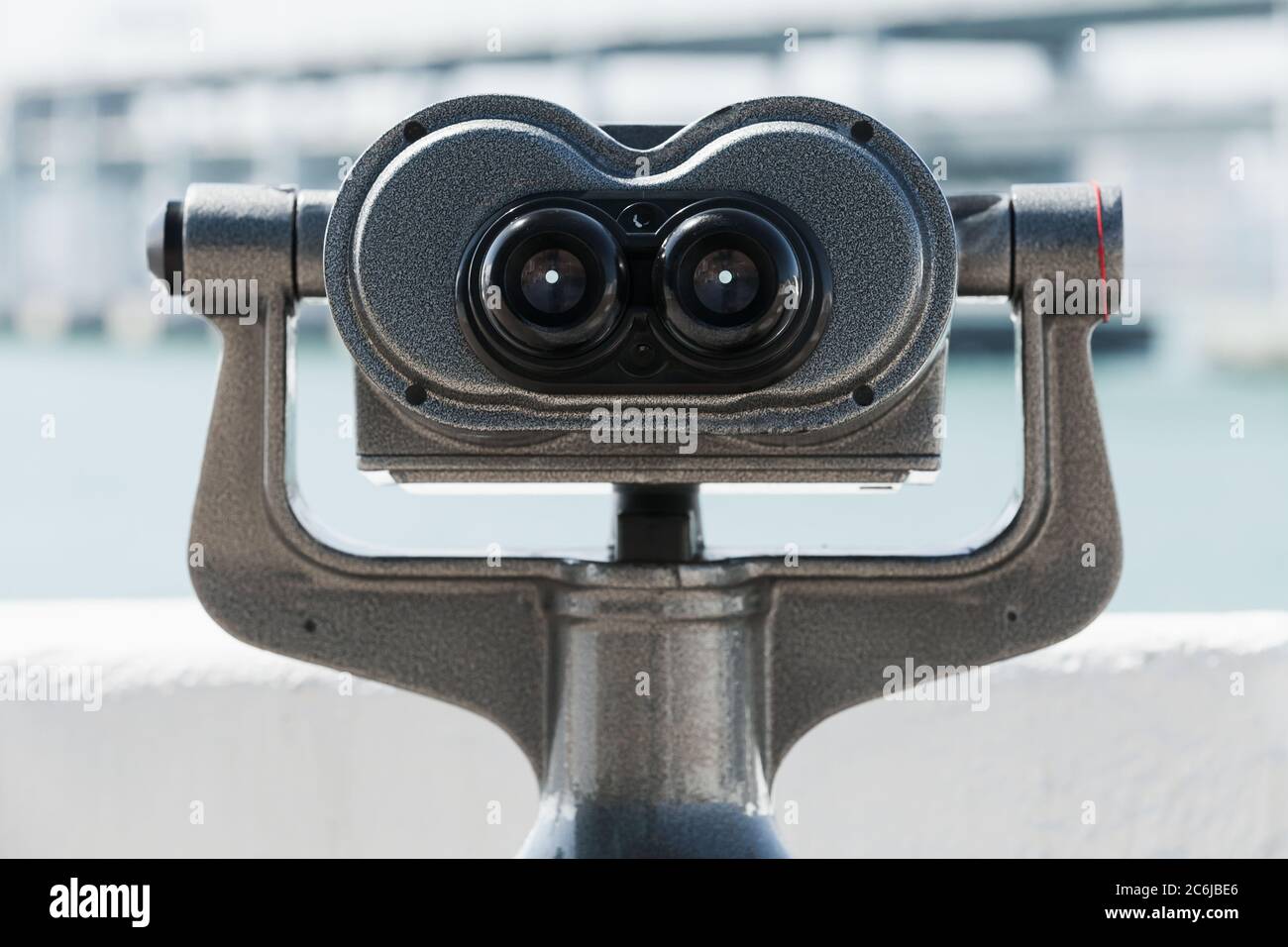 Touristic binocular telescope on a rotating base. Front view, close up ...