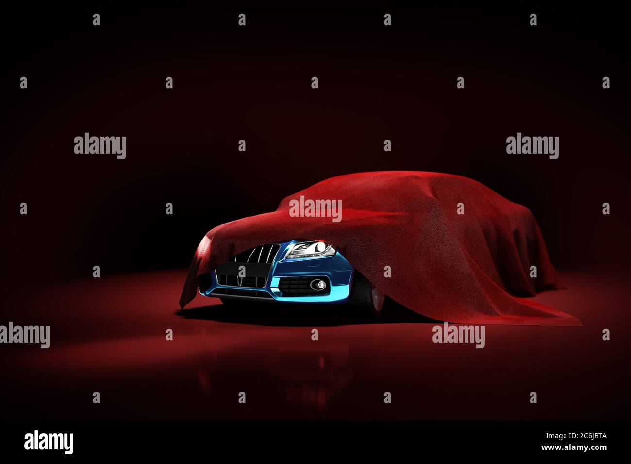 concept of presentation of the car under a red cloth in a darck red ...
