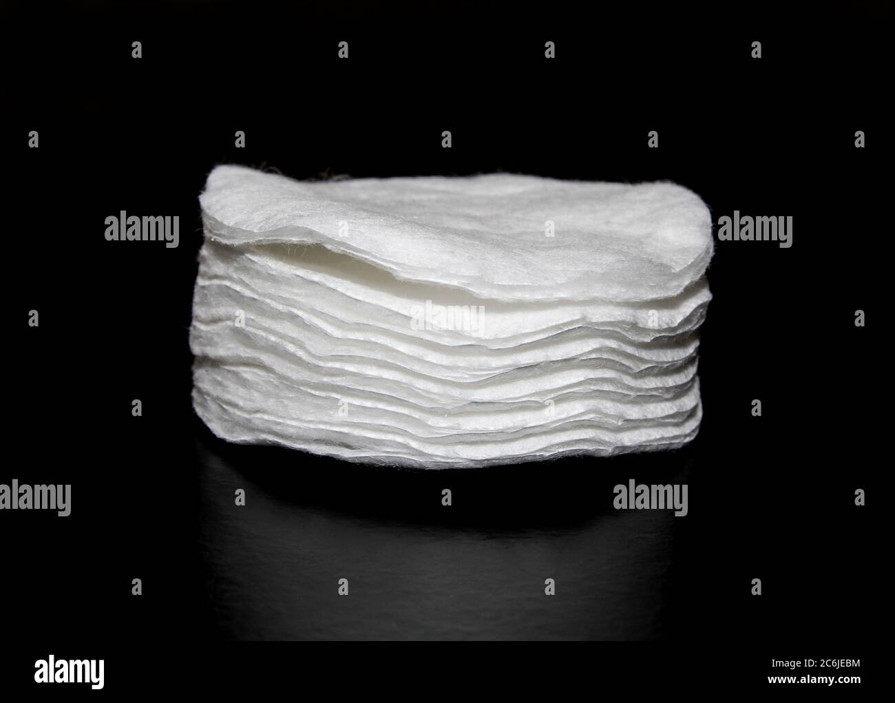 White cotton pads make up remover. Stack of Buds/swabs isolated on ...