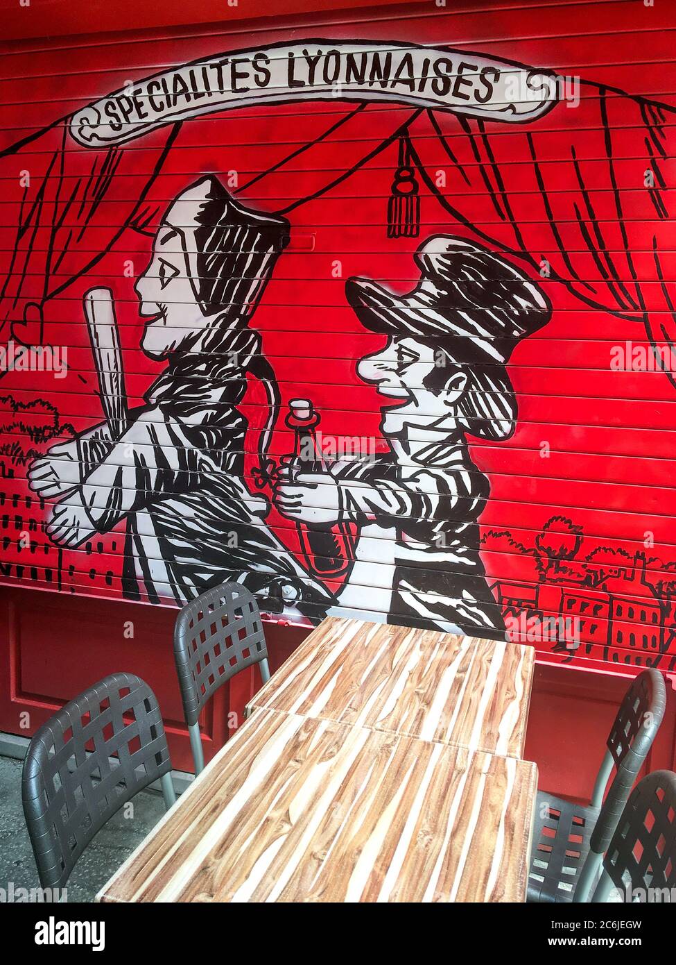 Guignol and Gnafron, painted figures on a restaurant facade, Lyon ...