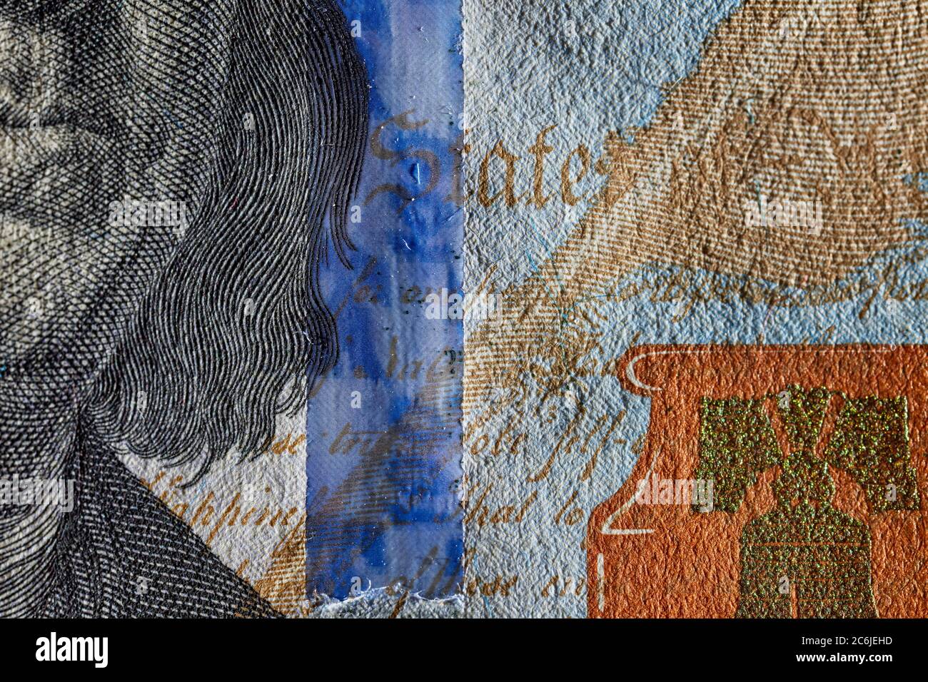 Blue 3-D security ribbon woven into the bill's paper of US$100 banknote ...