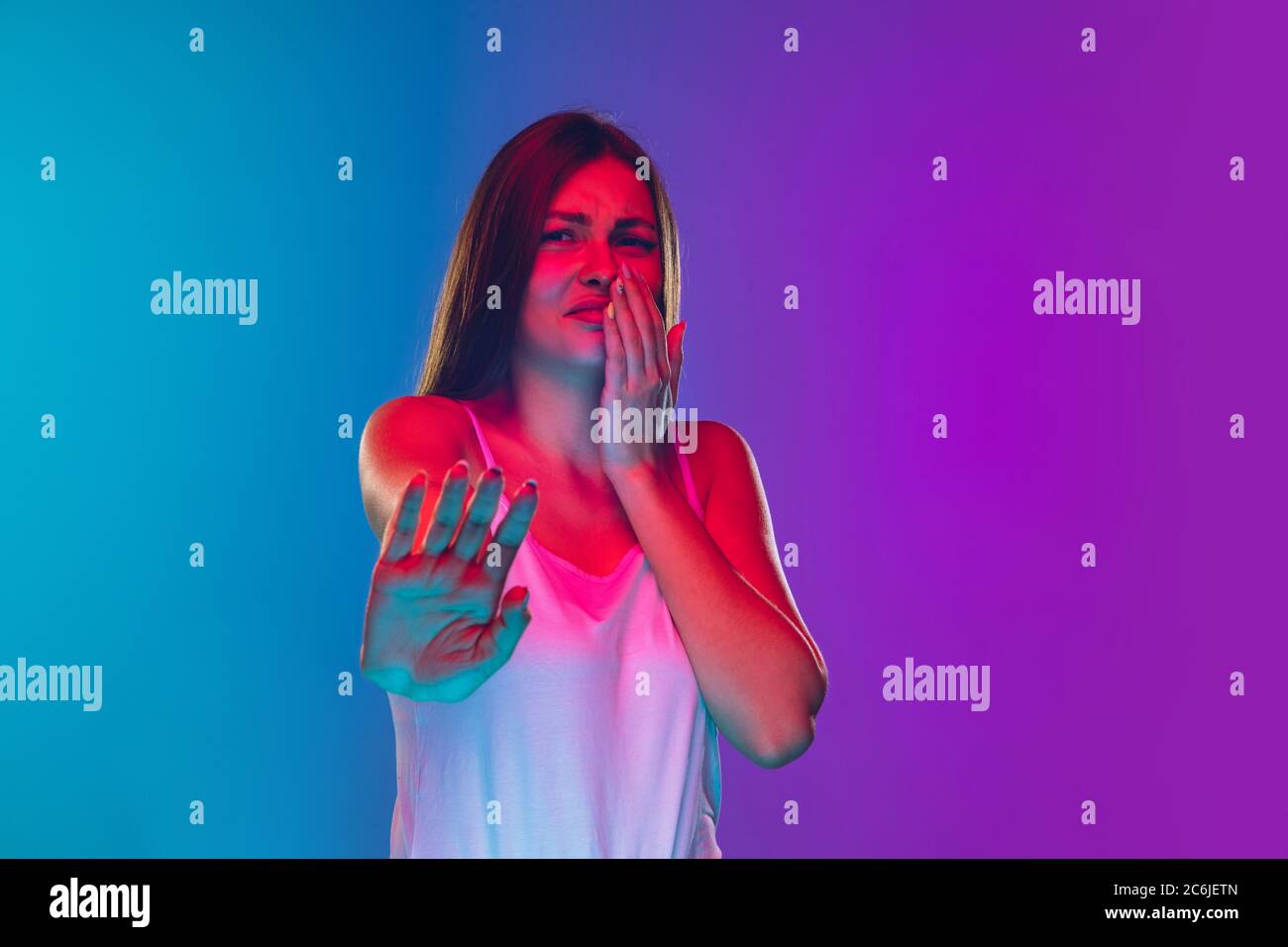 Scared, rejecting, stopping. Caucasian young woman's portrait on ...