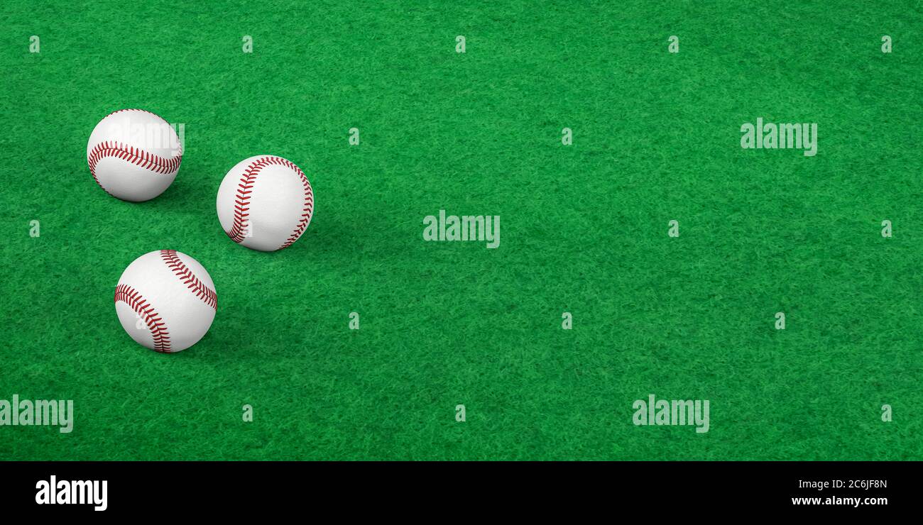 Three baseball balls lie on a green felt background with space for text ...