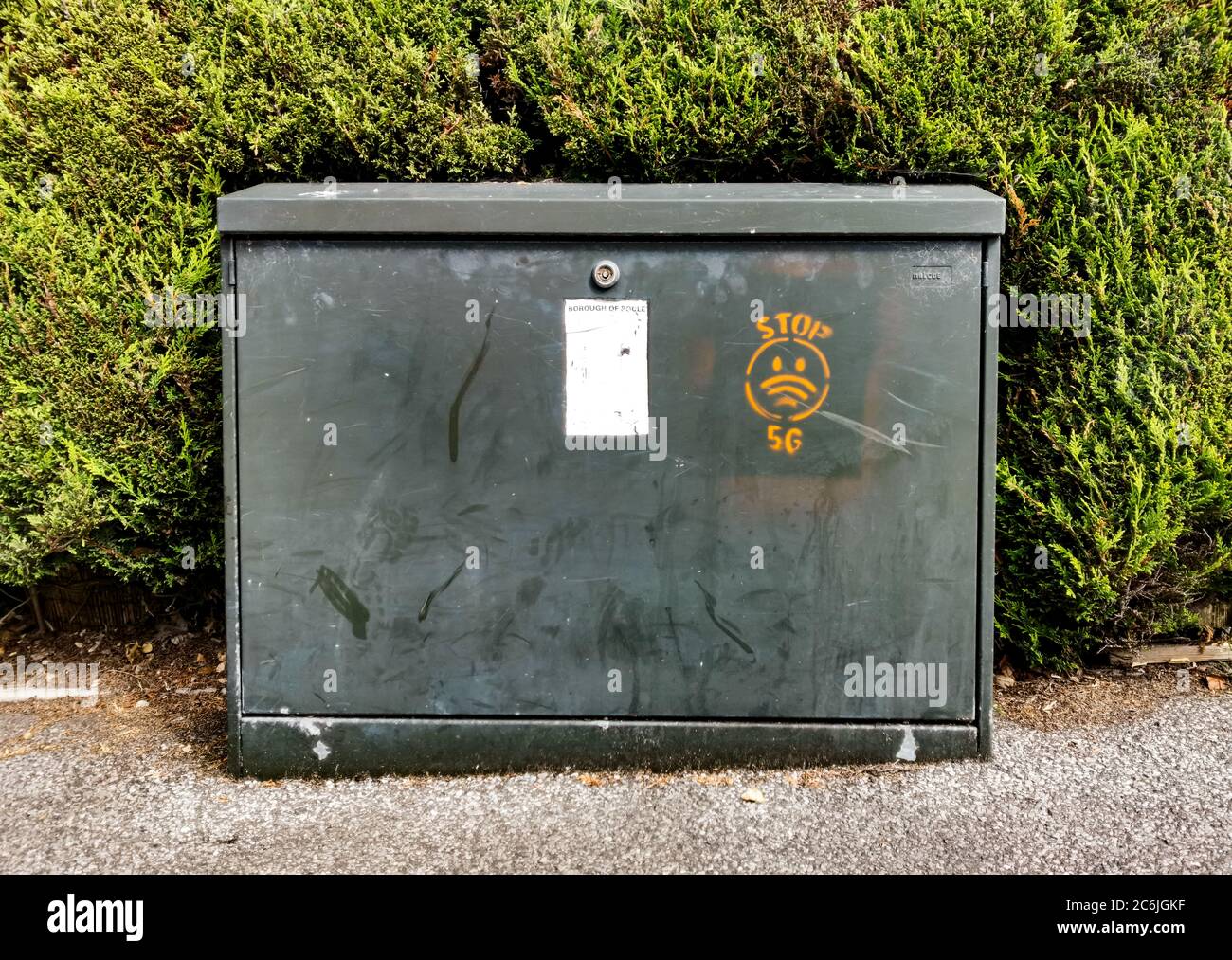 Poole, UK. 10th July, 2020. Anti-5G graffiti is sprayed on numerous ...