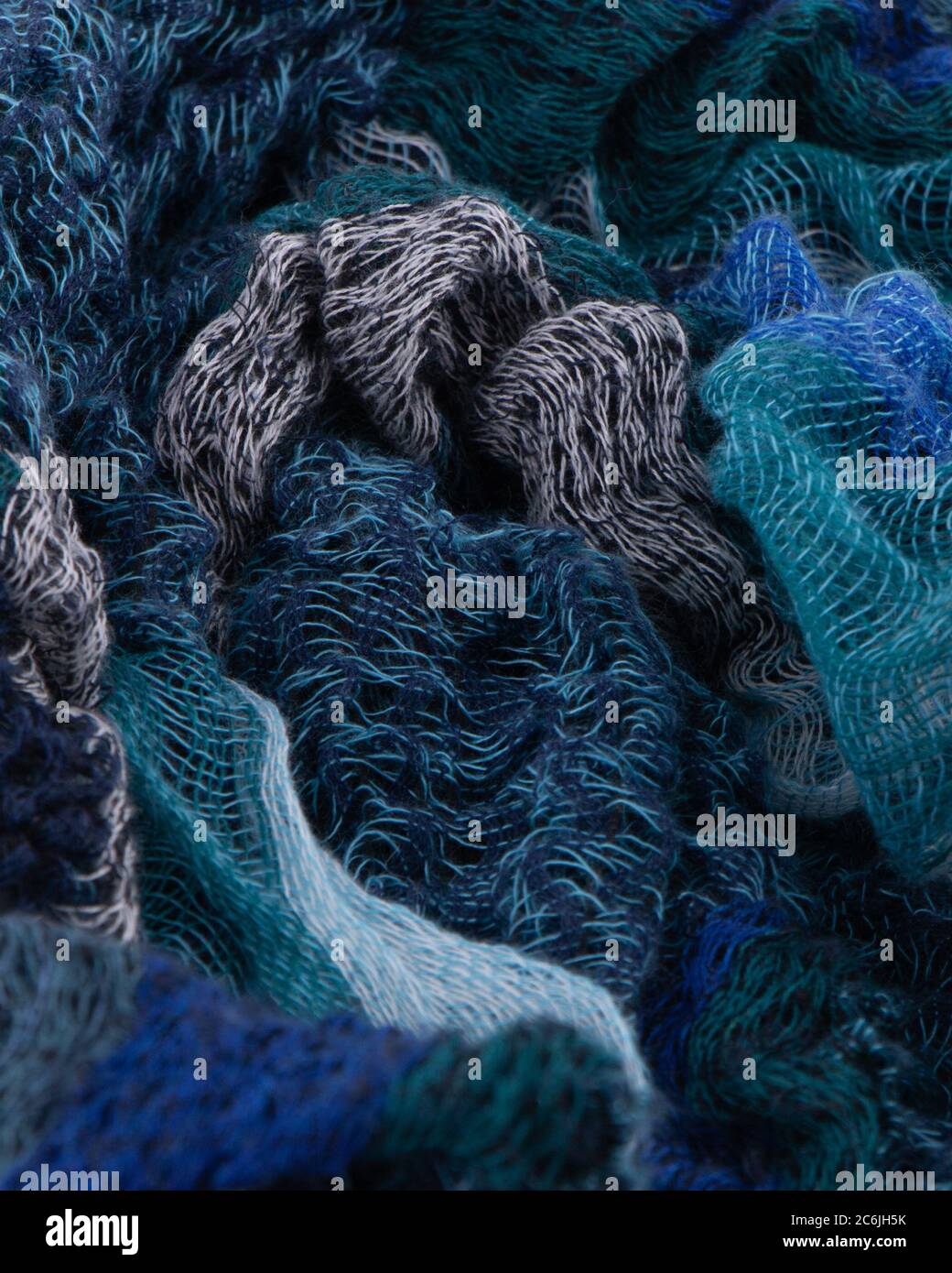 Knitted in Multi Blue Wools crumpled layers Vertical Background Stock ...