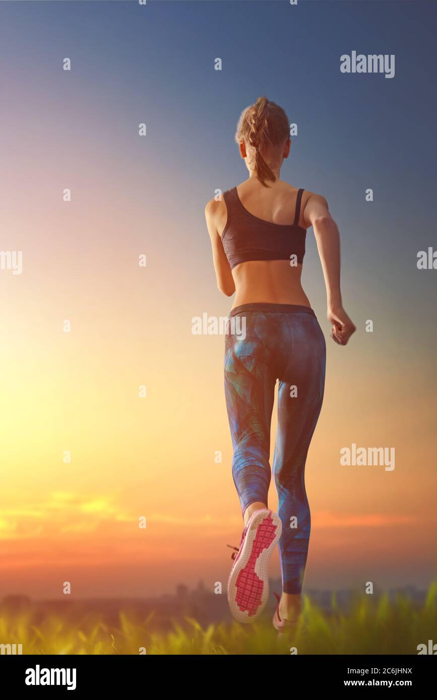 Healthy lifestyle and sport concepts. Woman in fashionable sportswear ...