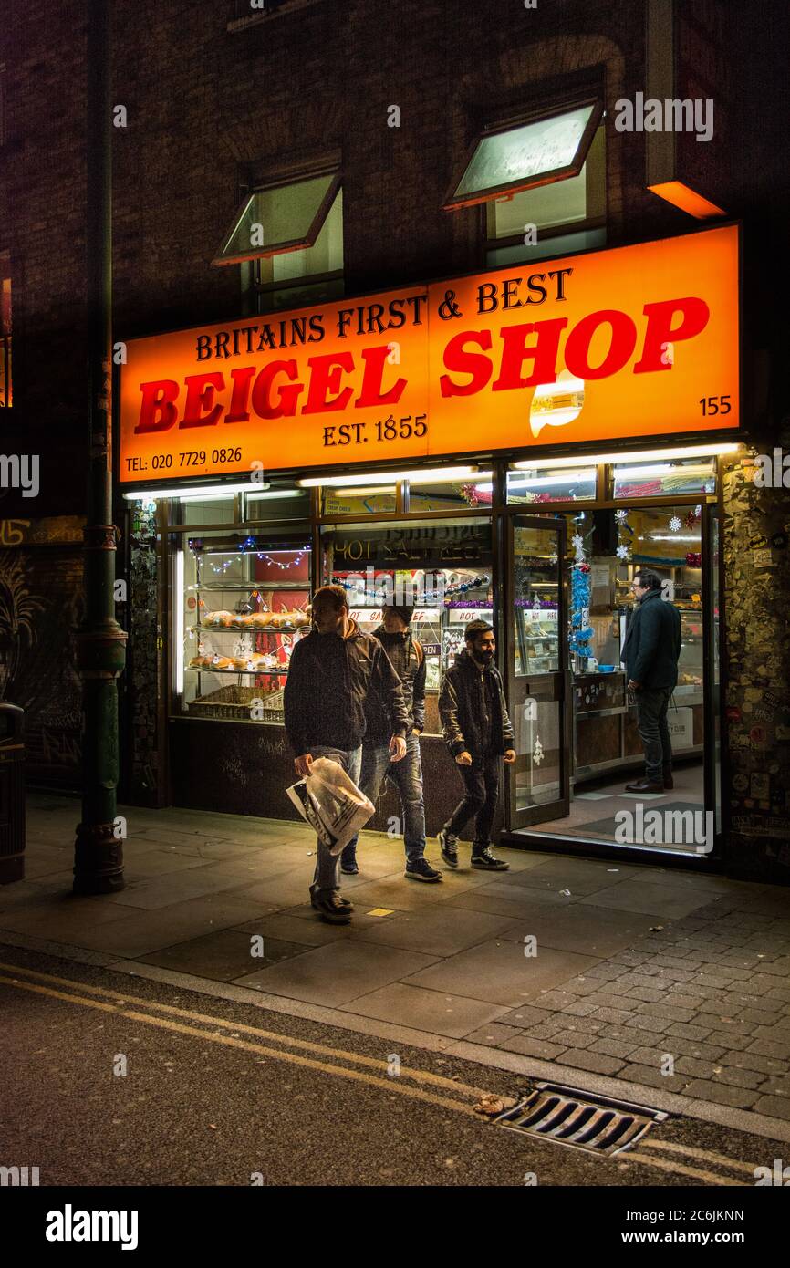 People standing outside Britain's first and best Beigel Shop on Brick ...