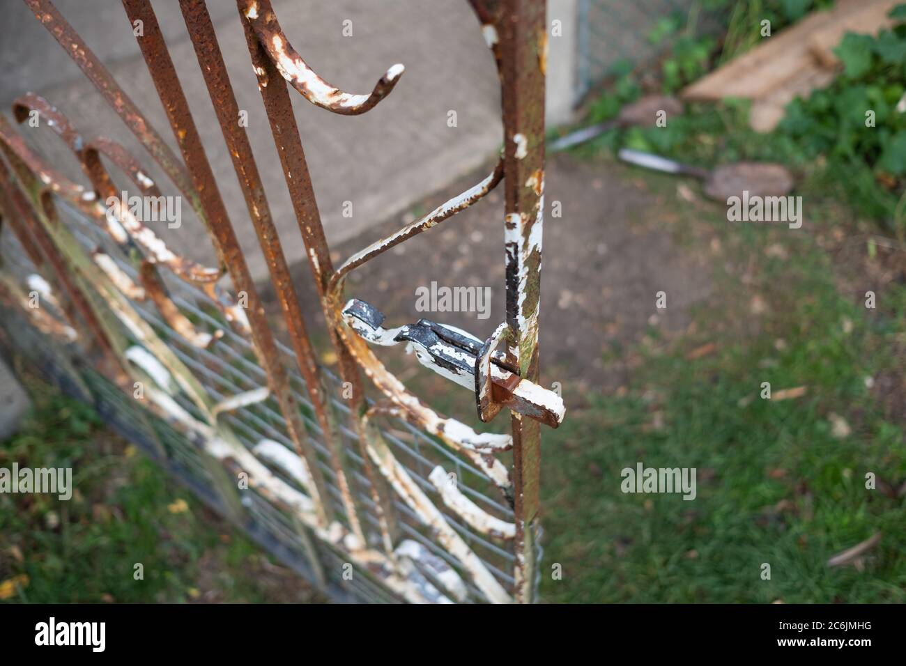 Shallow focus view of a wrought iron gate used to enter part of a ...