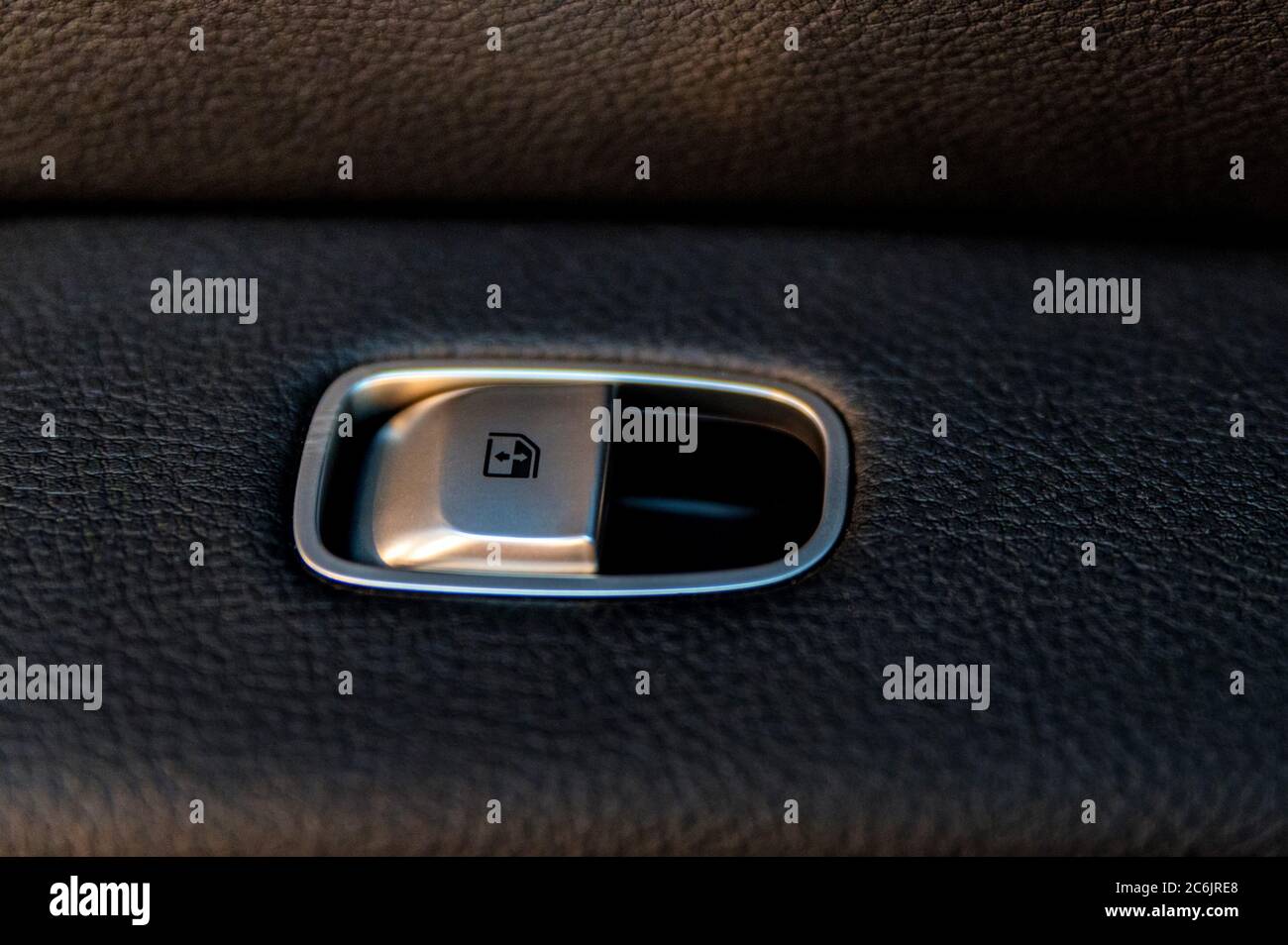 Close up black window lifter button in luxury car Stock Photo - Alamy