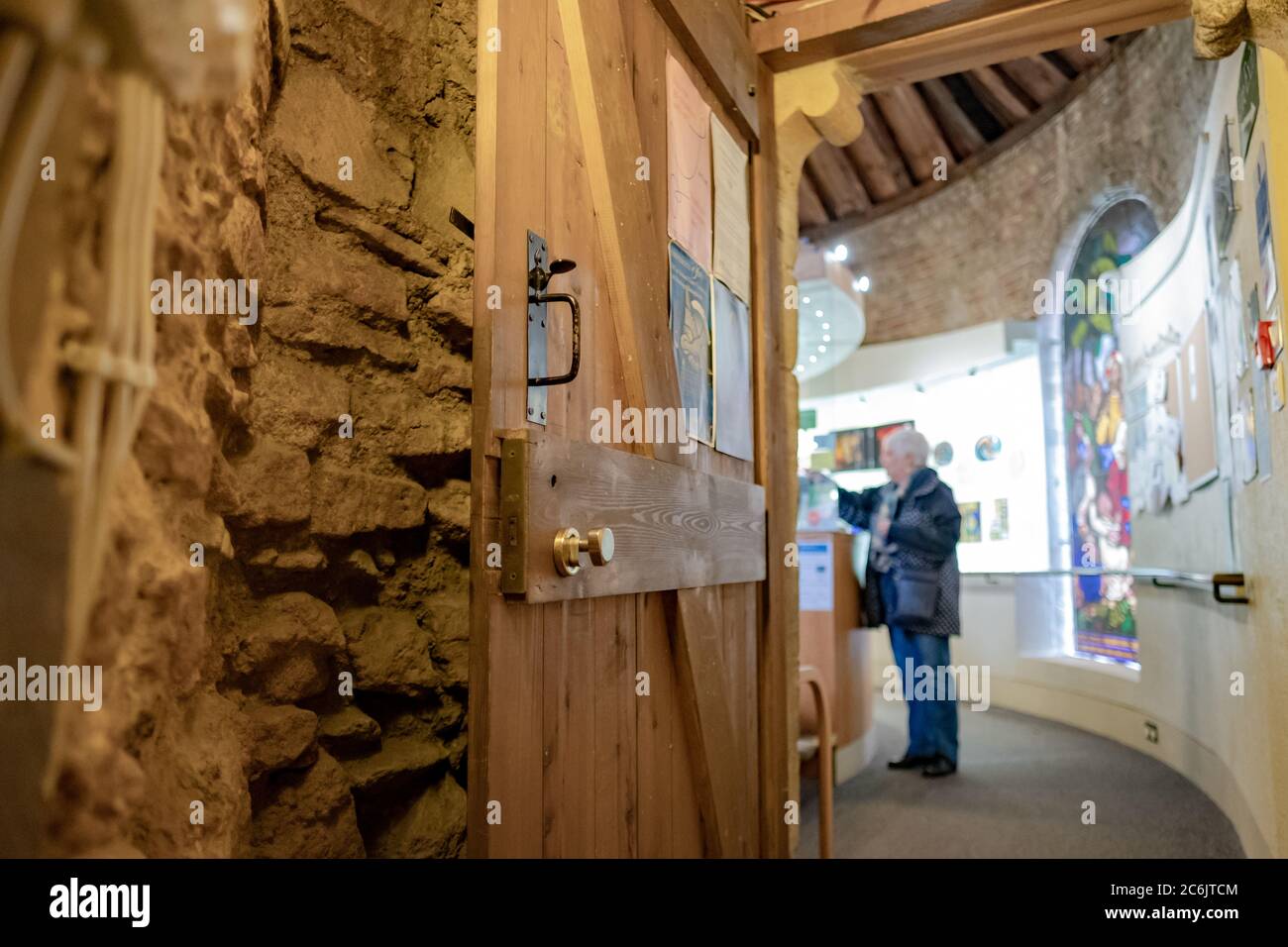 Shallow focus of very old, stained glass windows seen within an ...