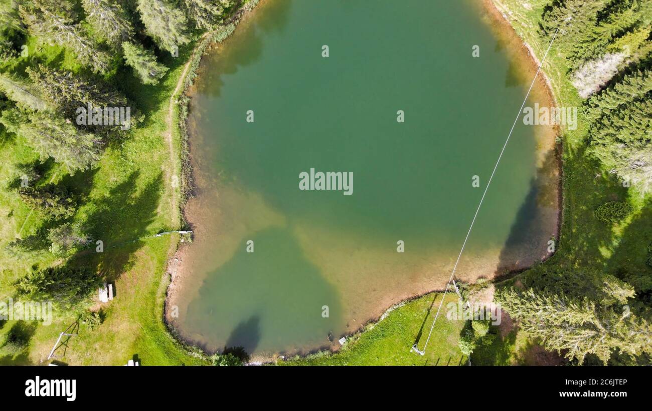 Alpin lake in summer time surrounded by beautiful forest, overhead ...