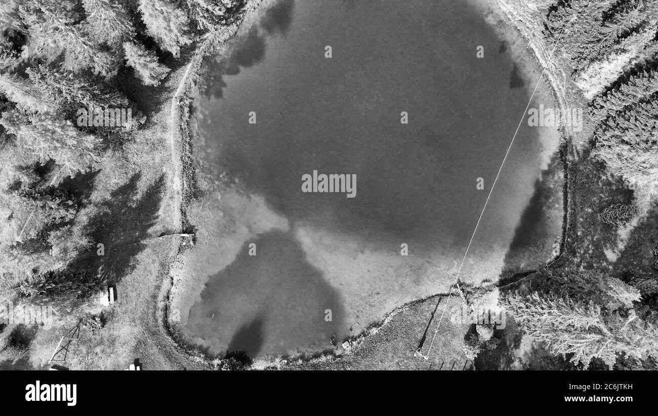 Alpin lake in summer time surrounded by beautiful forest, overhead ...