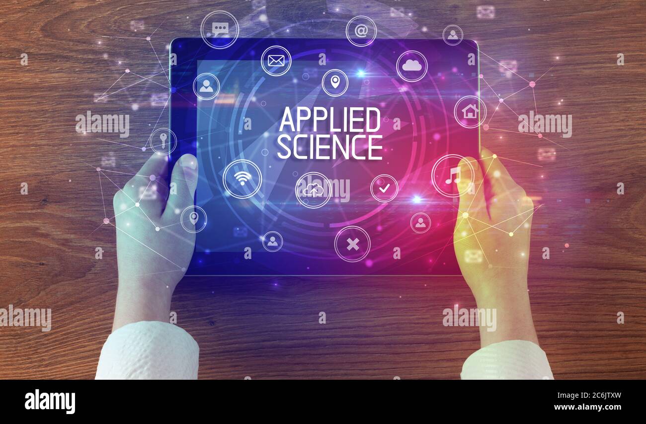 Close-up of a tablet with APPLIED SCIENCE inscription, innovative ...