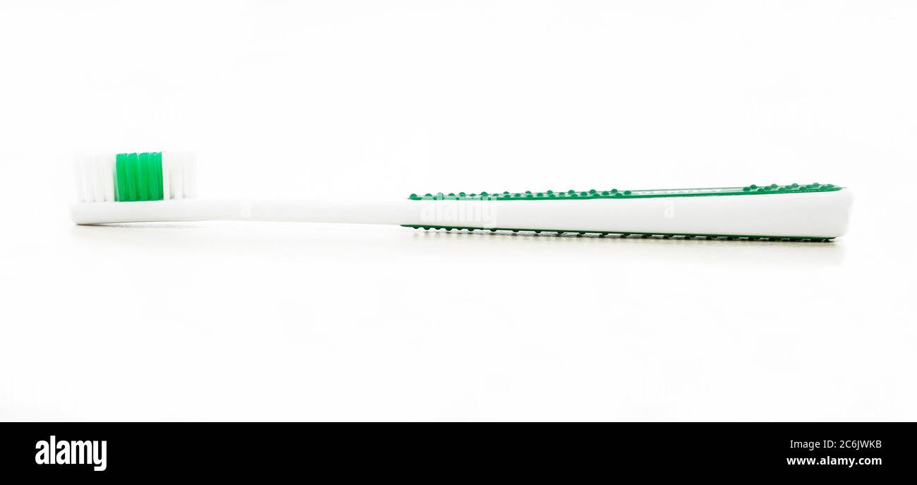 Toothbrush side view isolated on white background Stock Photo - Alamy