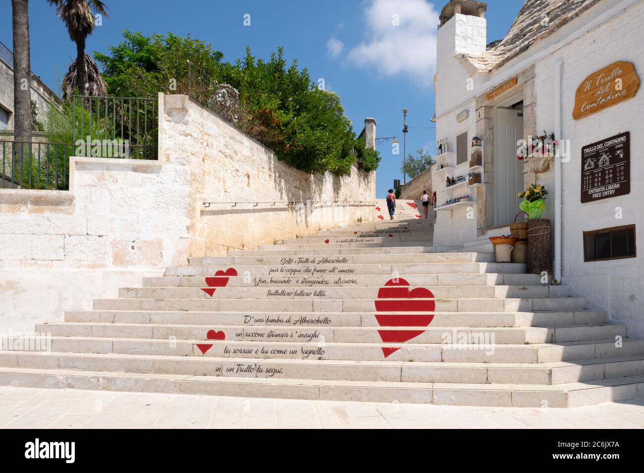Puglia, Italy - Alberobello, a view of the long marble staircase with ...