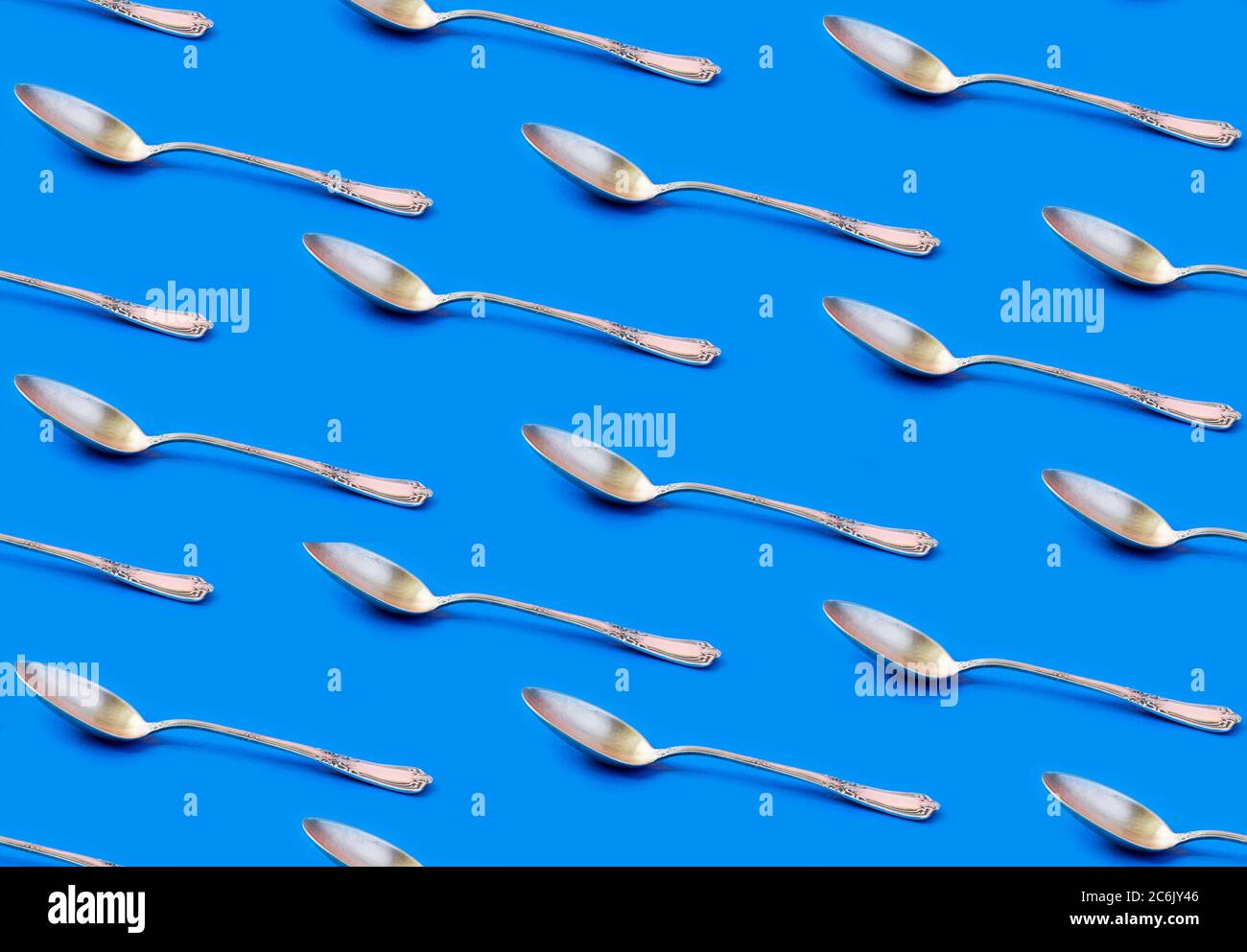 Seamless endless repeating pattern. spoons on a blue background Stock ...