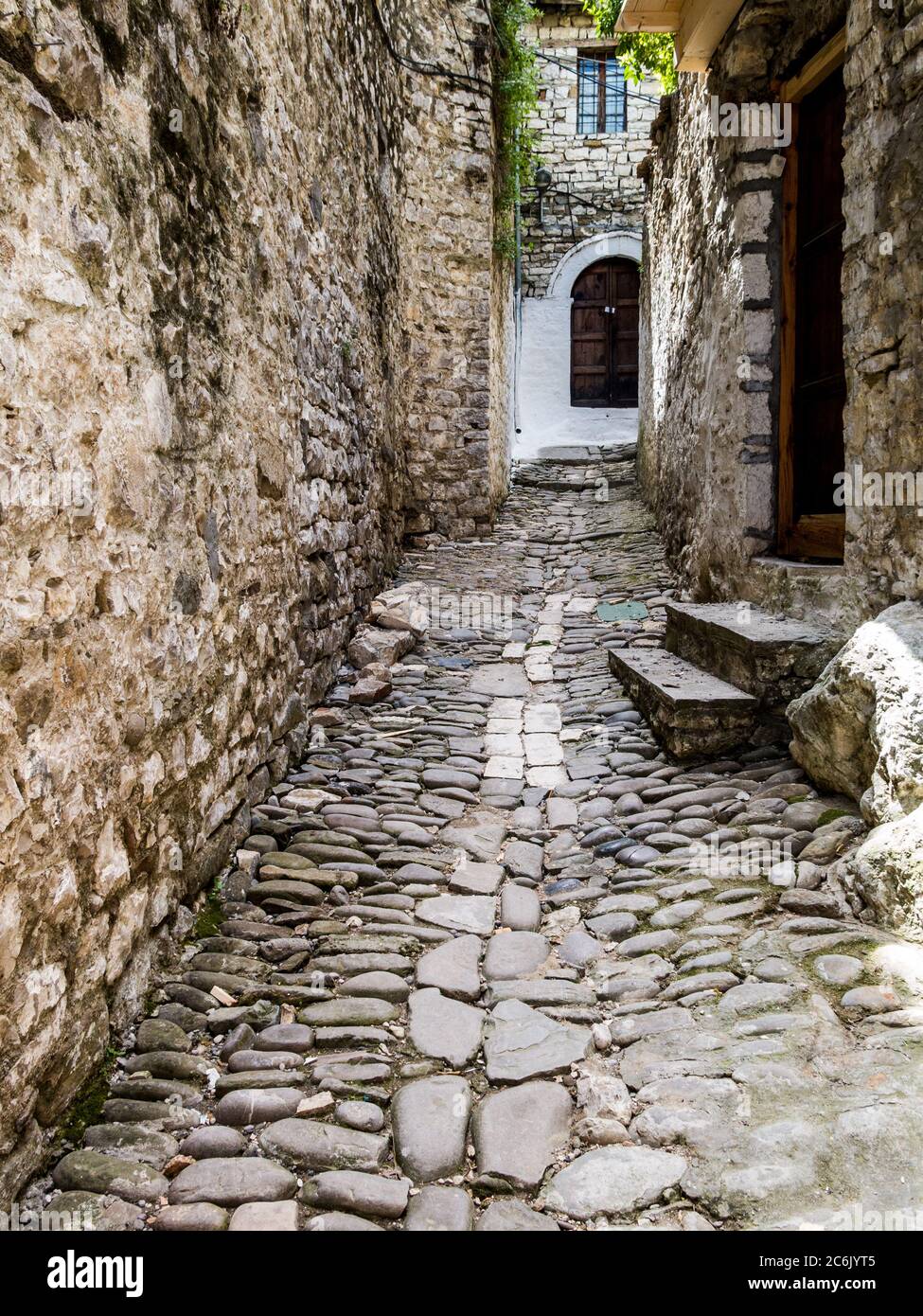 Quaint cobblestone alley within the historic city of Berat, Albania ...