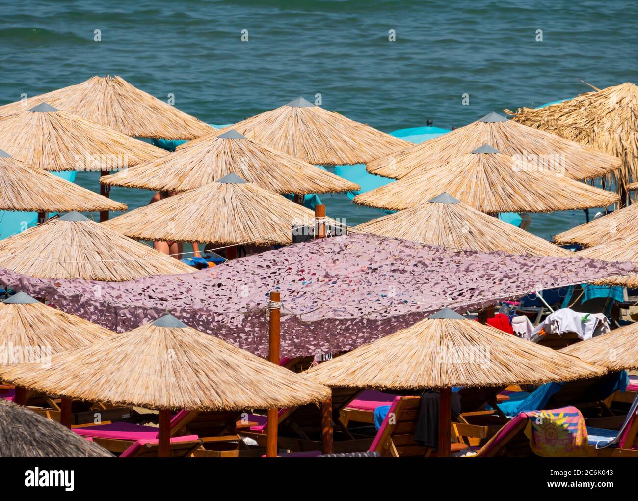 cane umbrellas on the beach Stock Photo - Alamy