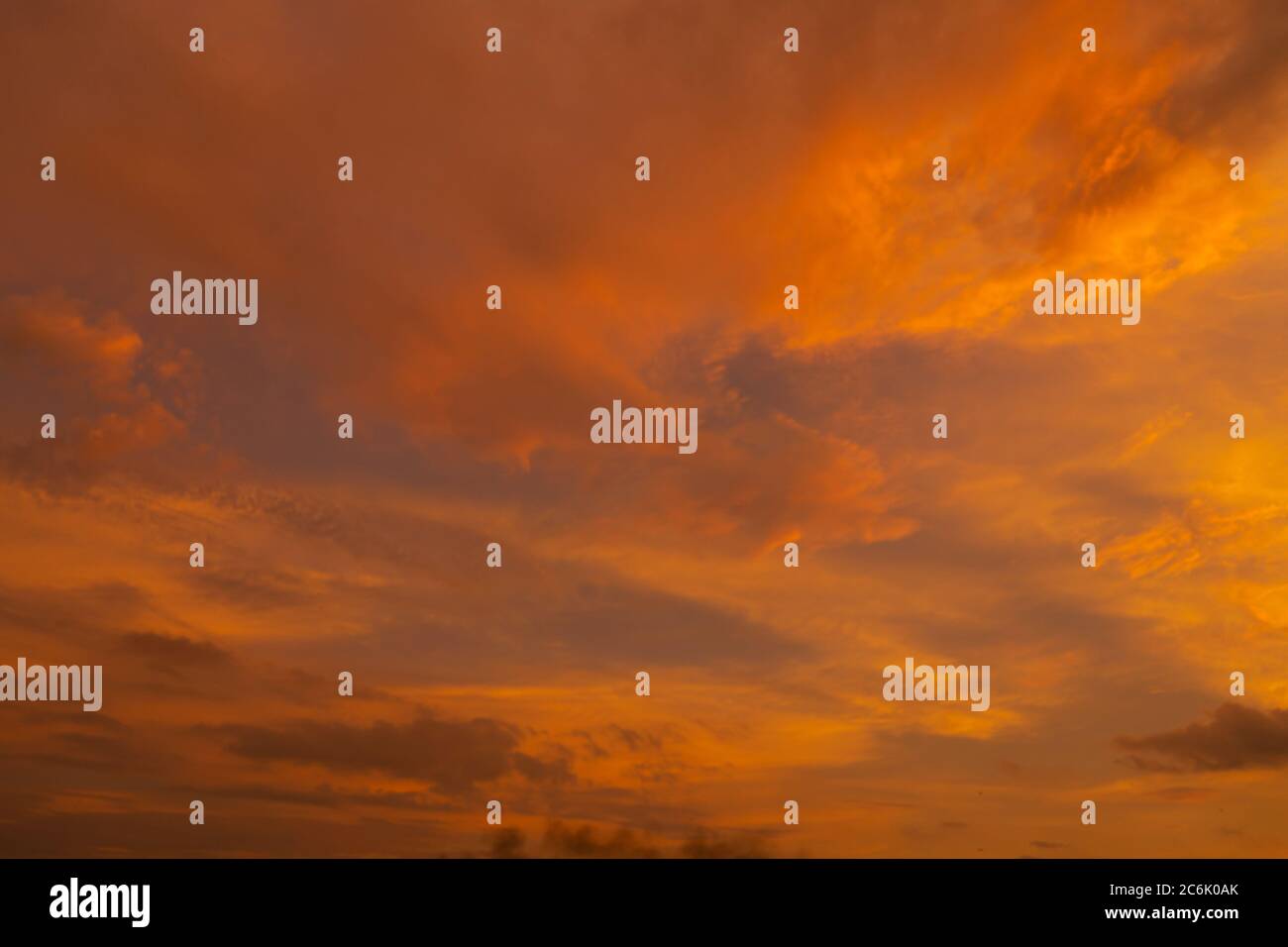 unusually beautiful fiery red tropical sunset. Burning clouds. Fire in ...