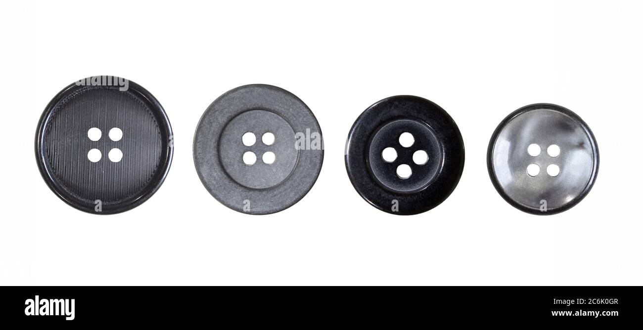 Set of different sewing buttons for clothes isolated on white ...