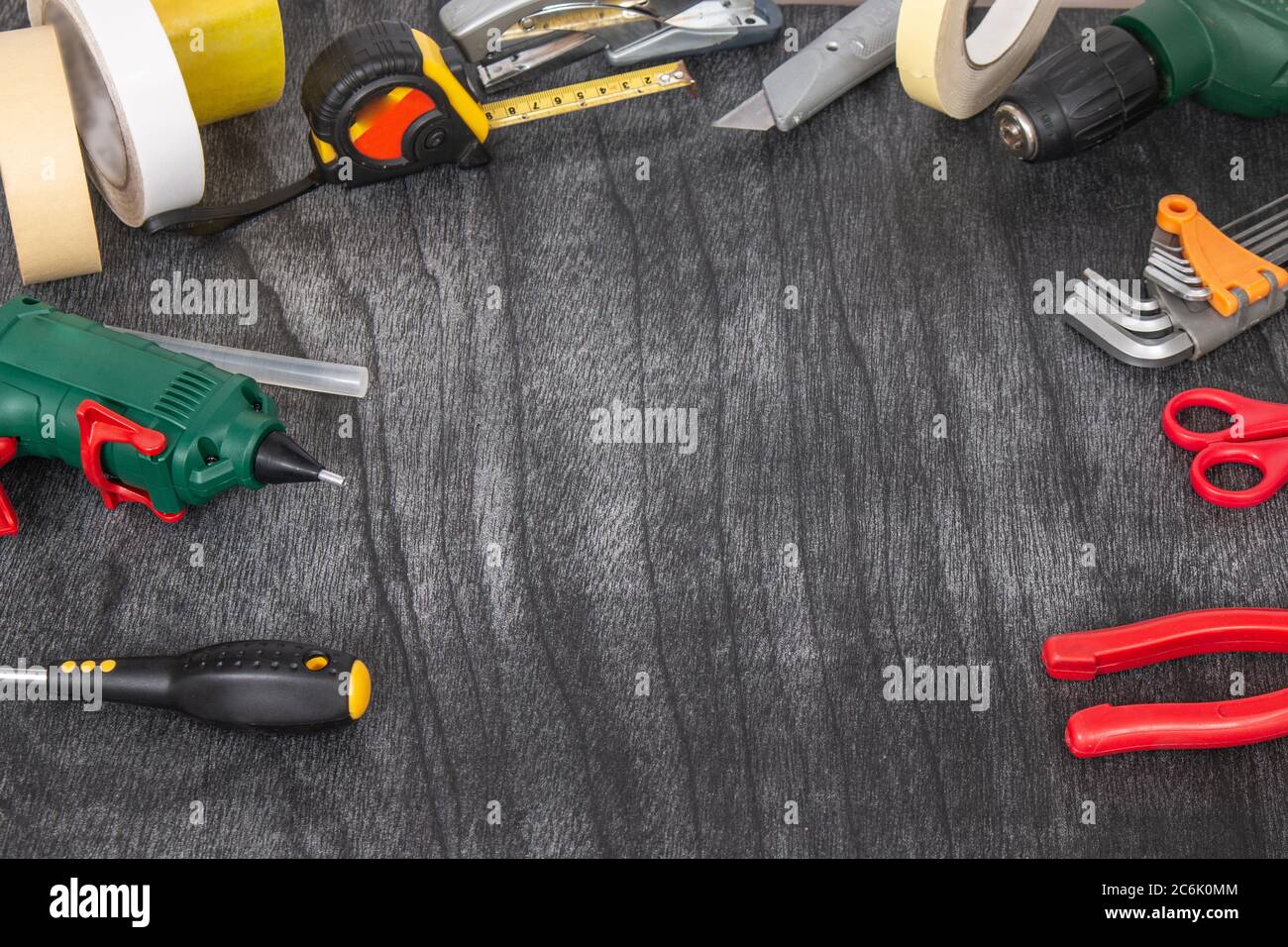 Do it yourself tools on grey wooden background. DIY tools with copy ...
